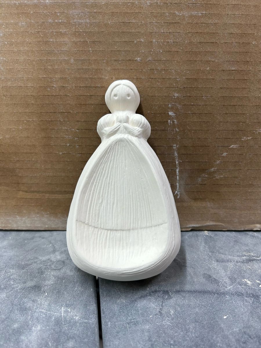 Corn husk lady spoon holder